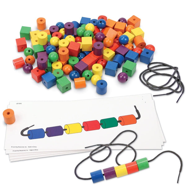 Beads and pattern card set. Colourful hardwood spheres, cubes and ...